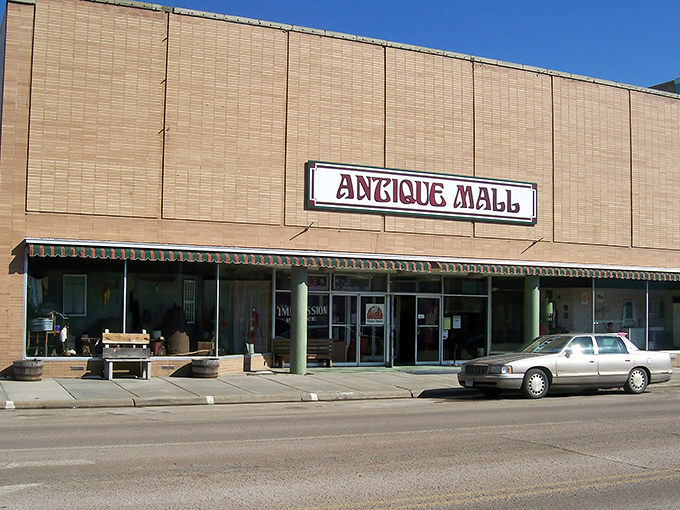 The unassuming exterior of Second Impression Palace Antique Mall hides a wonderland of treasures waiting to be discovered inside.
