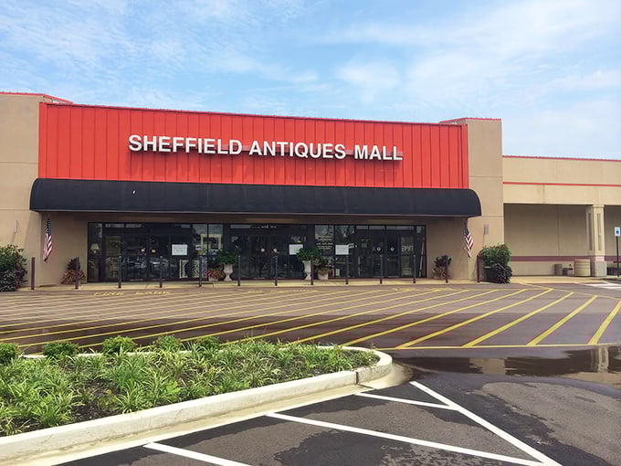 The iconic red facade of Sheffield Antiques Mall stands like a beacon for treasure hunters &ndash; the Fort Knox of vintage finds awaits behind those doors.