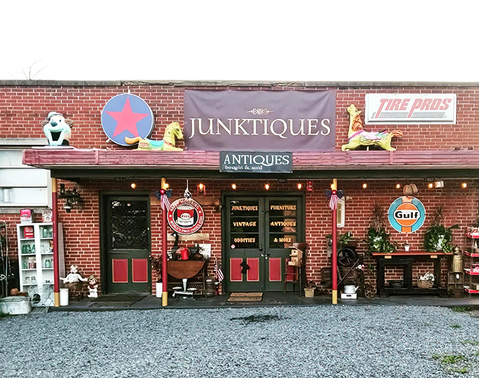 The brick facade of Junktiques beckons treasure hunters with its vintage carousel horses and nostalgic signage&mdash;a time portal disguised as a storefront.