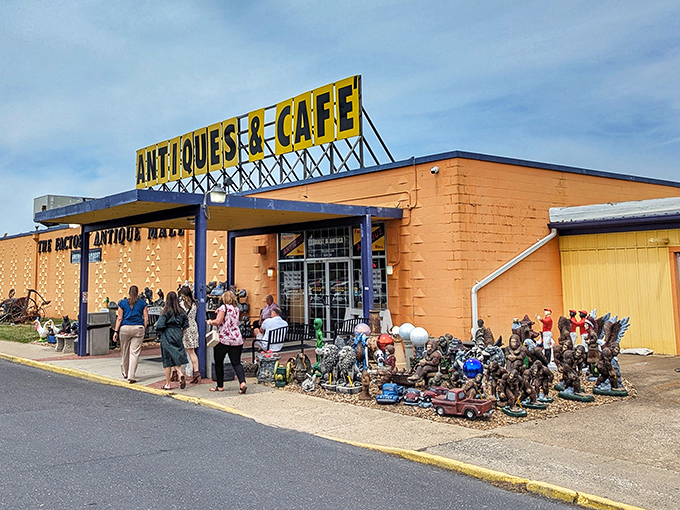 The bright orange exterior with its bold yellow signage isn't subtle – it's practically shouting, "Hey you with the wallet! Come see what we've got inside!"