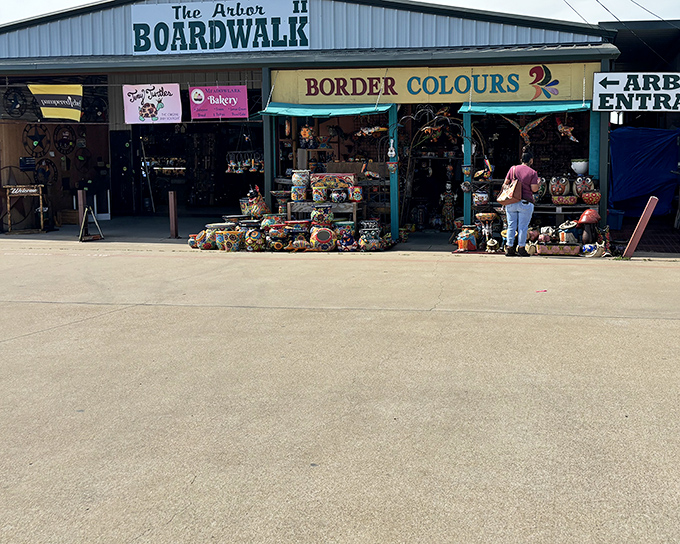 The Arbor Boardwalk beckons shoppers with its colorful storefronts and promise of treasures. Like a Texas-sized department store without walls or return policies.