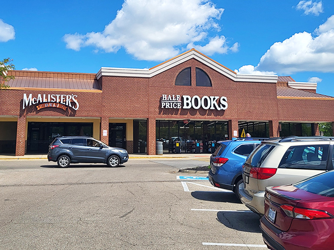 The brick facade of Half Price Books in Beavercreek promises literary treasures within, like a temple dedicated to the worship of affordable words.