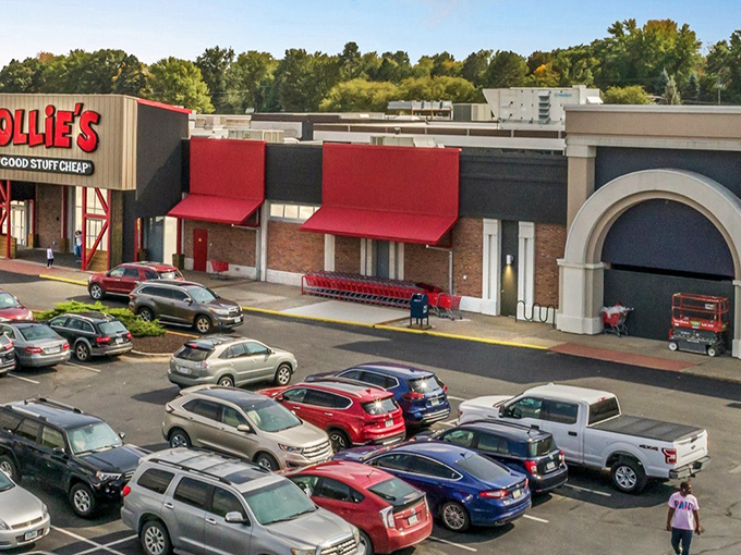 The iconic red and white Ollie's storefront promises treasure hunting adventures within. Their "Good Stuff Cheap" motto isn't just marketing&mdash;it's a way of life.