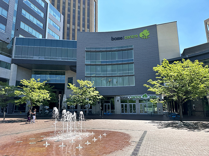 The Boise Centre provides a sleek urban backdrop to the market's vibrant energy, where fountain-side gatherings become impromptu social clubs.