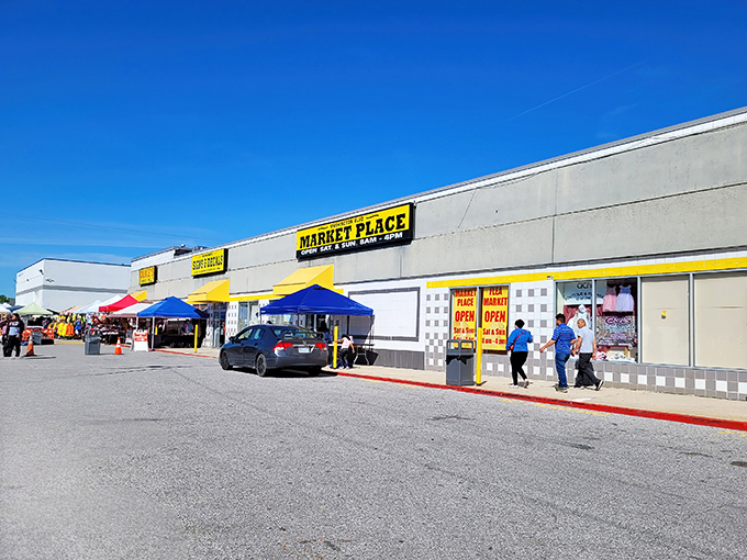 The unassuming exterior of Washington Boulevard Marketplace hides a treasure trove within. Like finding a secret level in a video game, but with better souvenirs.