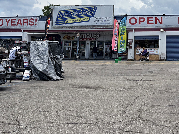 The unassuming exterior of Dixieland Flea Market hides a universe of treasures within. Like a time machine disguised as a strip mall storefront.