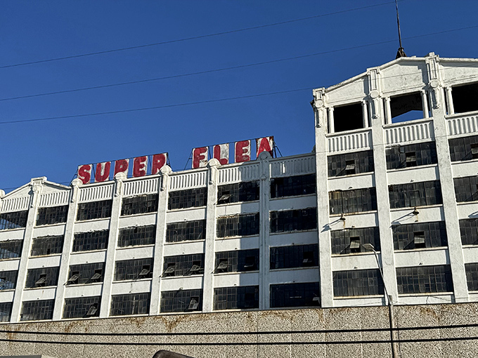 The iconic Super Flea sign crowns this multi-story treasure trove like a bargain hunter's North Star, beckoning weekend warriors from across Kansas City.