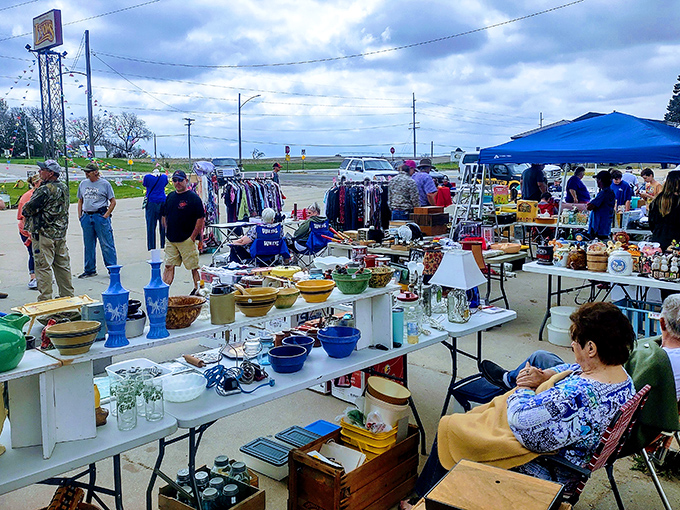 Treasure hunters paradise! Tables laden with colorful bowls, vintage glassware, and everyday artifacts waiting for their second chance at usefulness.