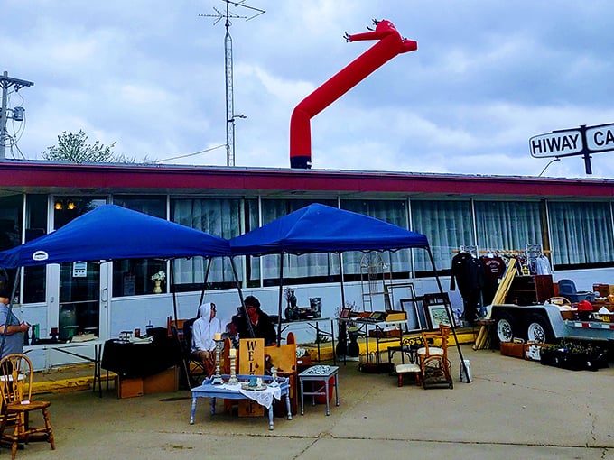 Treasure hunters paradise! Tables laden with colorful bowls, vintage glassware, and everyday artifacts waiting for their second chance at usefulness.