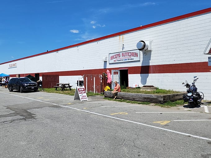 The unassuming exterior of Salem NH Flea Market belies the treasure trove within. That red trim is basically a bat signal for bargain hunters.