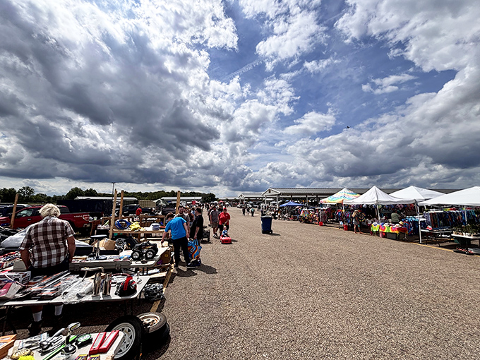 The outdoor flea market stretches like a small city of possibilities under Ohio skies, where one person's castoffs become another's treasures.