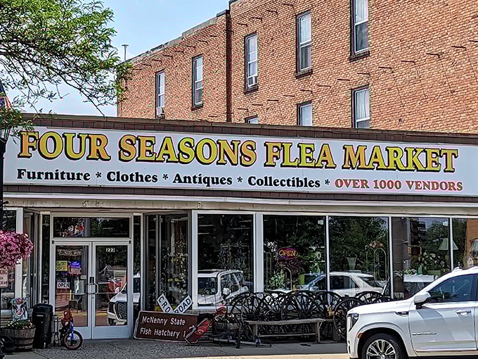The iconic storefront of Four Seasons Flea Market beckons with promises of treasures waiting inside this Madison landmark.