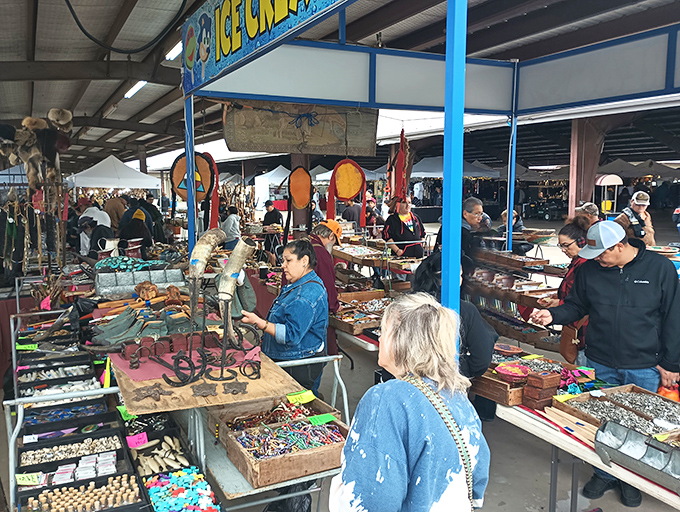 Treasure hunters browse endless rows of trinkets and collectibles under Traders Village's covered pavilions. One person's junk is another's must-have masterpiece.
