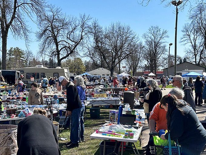 Early birds catch more than worms at Shawano's spring markets. The bare trees and bundled shoppers hint at Wisconsin's seasonal opening, when the most serious collectors emerge from hibernation.