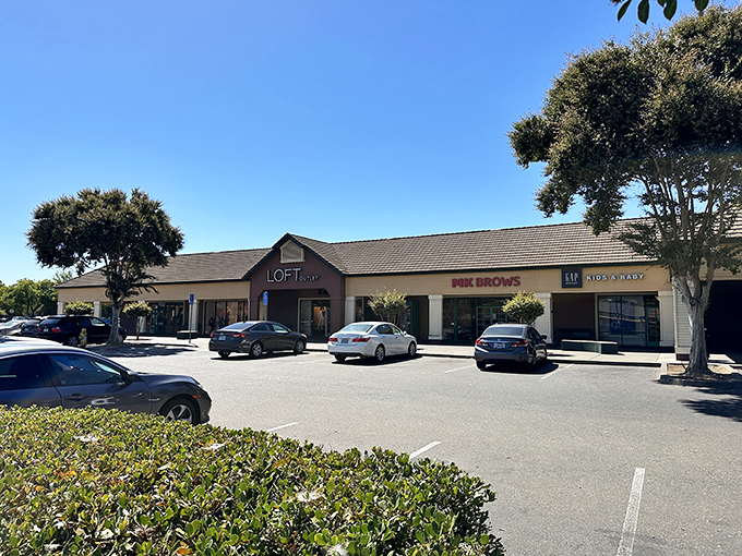 Mission-style architecture under California's endless blue sky – LOFT, Pinkberry, and more await shoppers looking for deals that won't break the bank.