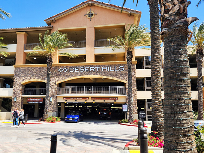 The multi-level parking structure welcomes bargain hunters with the promise of designer treasures within. Those palm trees aren't just for show&mdash;they're shade for your victory march back to the car.
