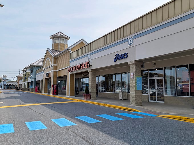The coastal-inspired architecture of Tanger Outlets Surfside creates a shopping village vibe that feels distinctly more relaxing than your average mall experience.