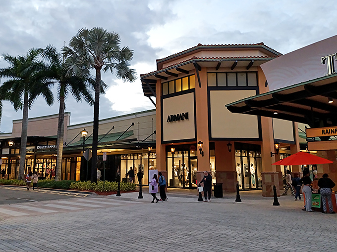 The Mediterranean-inspired architecture of The Colonnade Outlets section whispers luxury while your wallet screams "Help!" in seven languages.