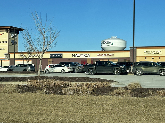 The iconic Altoona water tower stands sentinel over a retail paradise where Cole Haan, Nautica, and A&eacute;ropostale await your wallet's surrender.