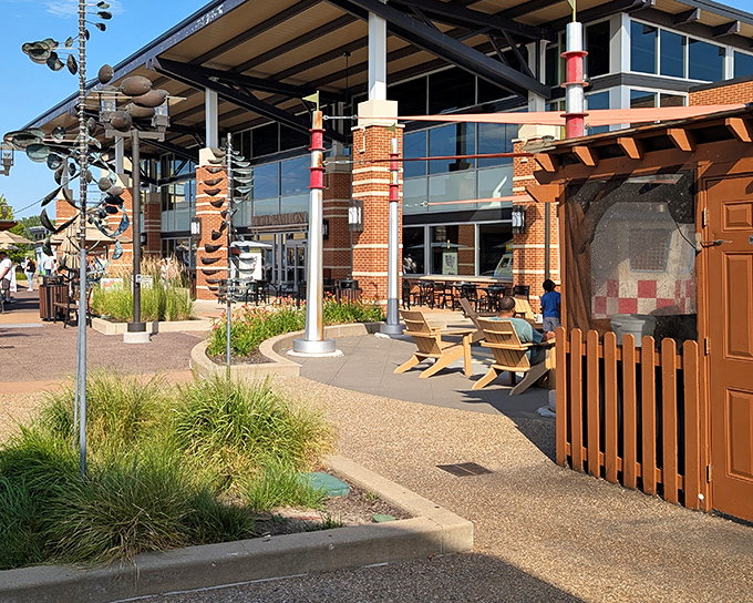 Modern architecture meets shopping paradise at St. Louis Premium Outlets, where outdoor seating areas provide welcome respite for weary bargain hunters.