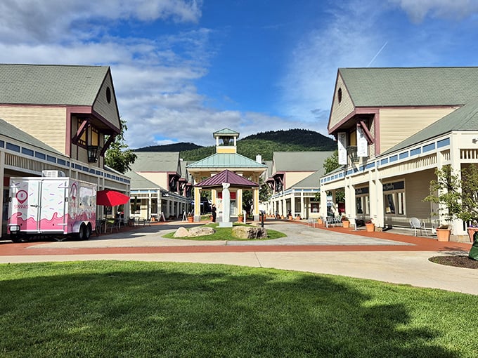 The grand entrance to Settlers Green welcomes shoppers like the pearly gates of retail heaven, complete with mountain views that remind you this isn't your average strip mall.