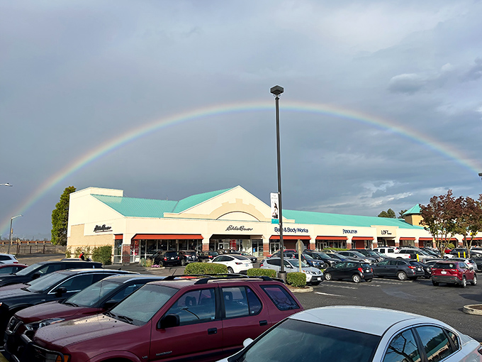 Nature's own welcome sign! A perfect rainbow arches over Columbia Gorge Outlets, as if the shopping gods are blessing your bargain-hunting expedition.