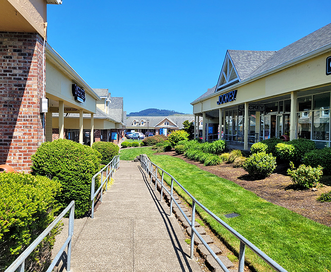 The coastal sunshine welcomes bargain hunters to Lincoln City Outlets, where manicured pathways lead to retail adventures and your wallet breathes a sigh of relief.