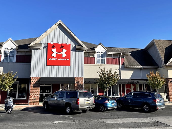 The colonial-inspired architecture of Under Armour's storefront proves that even discount shopping can come with a side of historical charm.
