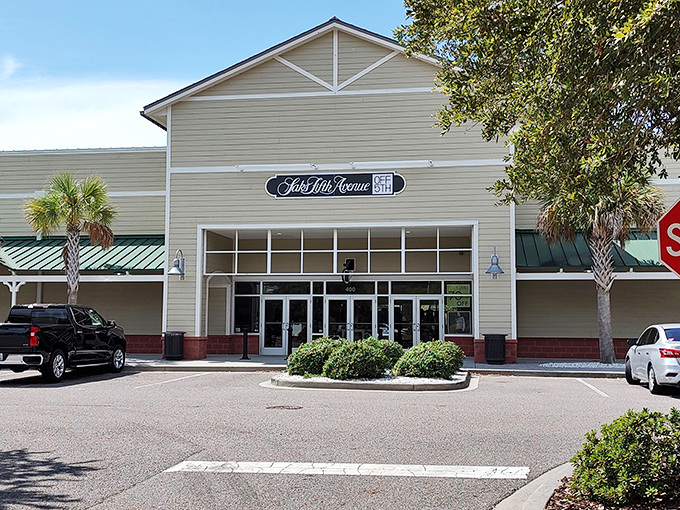 The coastal-inspired architecture of Saks Fifth Avenue at Tanger Outlets welcomes shoppers with its distinctive Lowcountry charm and promise of designer deals.