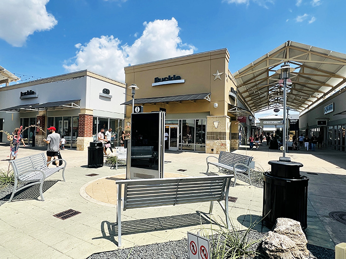 Serenity now! The open-air design of Houston Premium Outlets offers peaceful shopping corridors and strategically placed benches for weary bargain hunters.