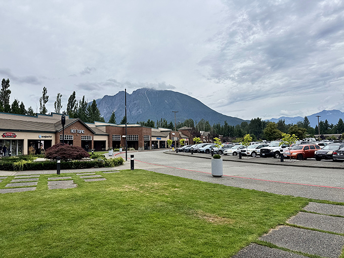 The Pacific Northwest aesthetic meets retail therapy at North Bend Premium Outlets, where mountain views and designer discounts create shopping nirvana.