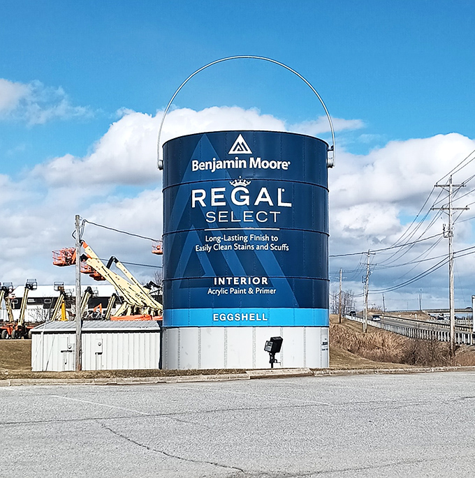 The ultimate conversation starter! Shippensburg's giant Benjamin Moore paint can towers majestically against the Pennsylvania sky, making household DIY projects seem hilariously inadequate by comparison.