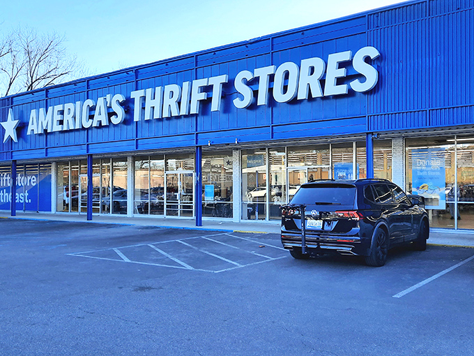 The iconic blue facade of America's Thrift Stores in Alabaster stands like a beacon of bargain possibilities against the morning sky.