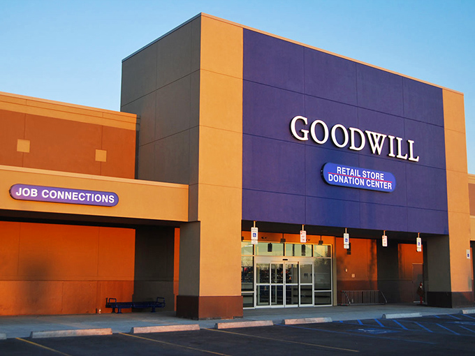 Rack after colorful rack stretches toward the horizon like a secondhand rainbow. The treasure hunt begins where the color-coded tags guide savvy shoppers to the best deals.