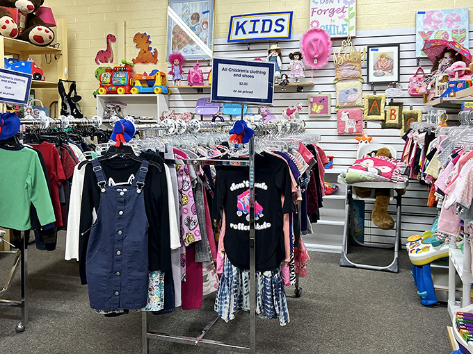 The iconic blue storefront with its cheerful red awning promises treasure hunting adventures within. Every visit to Cedar Closet begins with possibility.