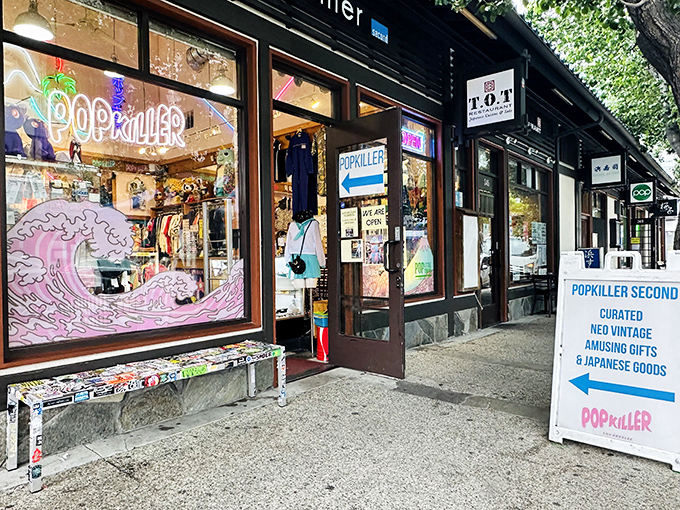 The storefront of Popkiller Second beckons with neon promise and a hand-painted wave that says, "Yes, the treasures inside are exactly this cool."
