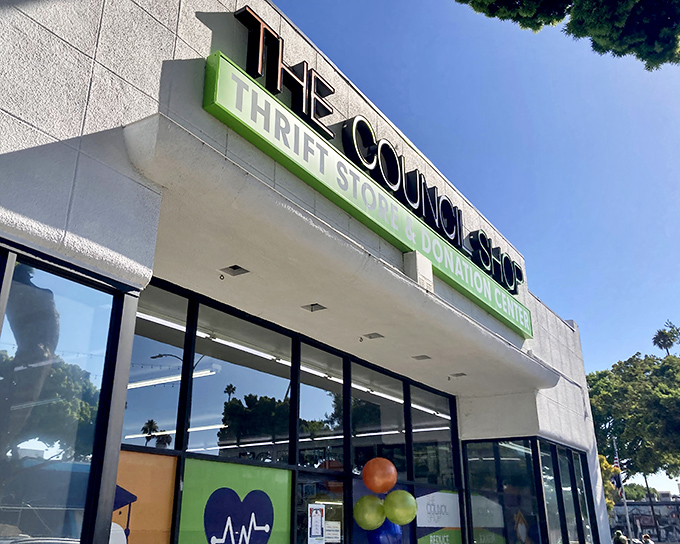 The iconic green and white signage of The Council Shop beckons treasure hunters like a lighthouse for bargain-loving ships at sea.