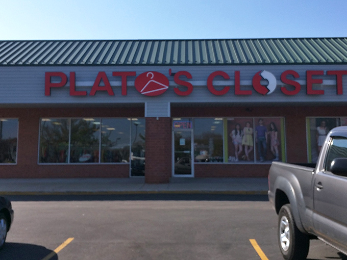 The iconic pink signage of Plato's Closet beckons like a fashion lighthouse, guiding style-seekers to a harbor of affordable finds.