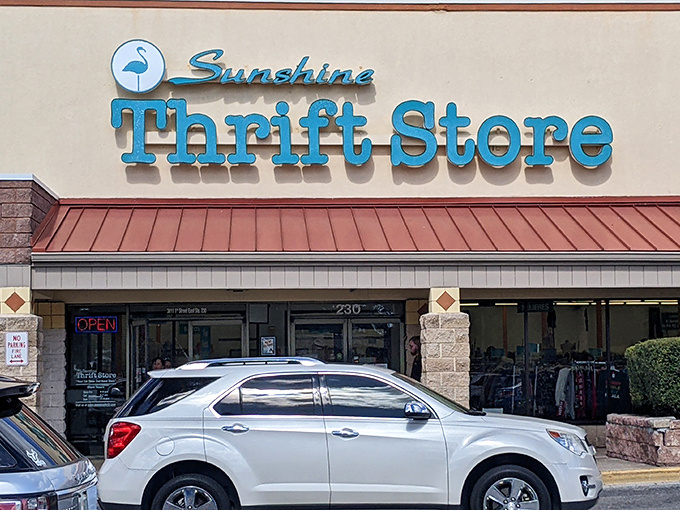 The iconic turquoise sign of Sunshine Thrift beckons bargain hunters like a beacon of budget-friendly bliss in Bradenton's retail landscape.