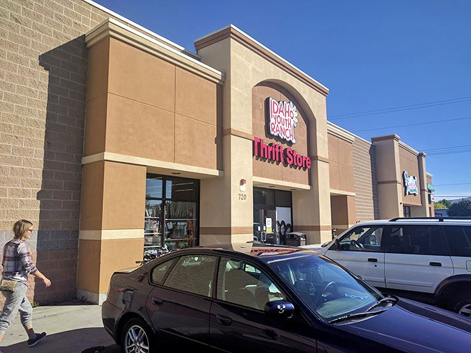 The storefront beckons like a budget-friendly beacon of hope under that gorgeous Idaho sky.