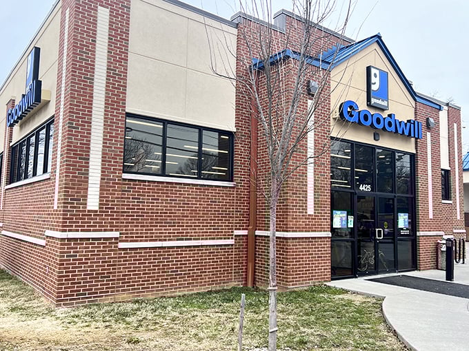 The brick facade of Goodwill on Shelbyville Road stands like a retail fortress, guarding treasures within that won't break your Kentucky budget.