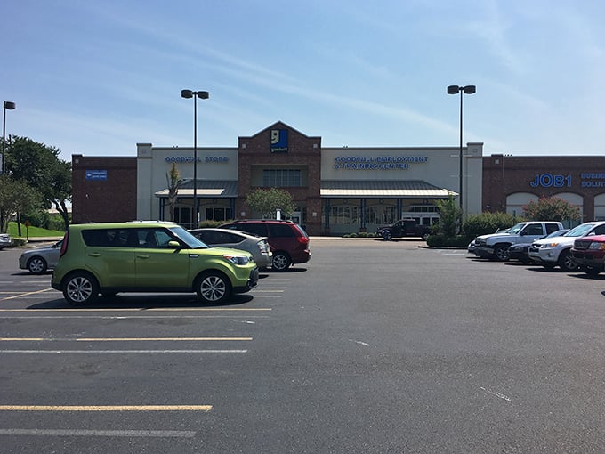 The iconic brick facade of Goodwill on Tulane Avenue stands like a temple to thrift, beckoning bargain hunters with its familiar blue smile logo.