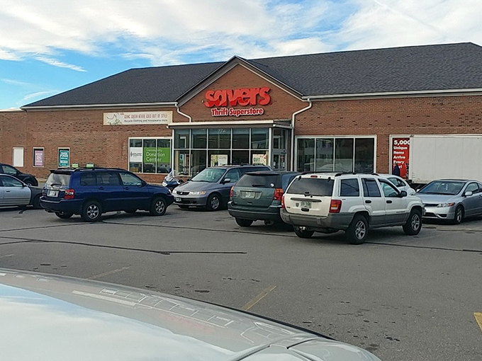 The brick facade of Savers in Manchester beckons with its iconic red sign&mdash;a siren call to bargain hunters and treasure seekers alike. 