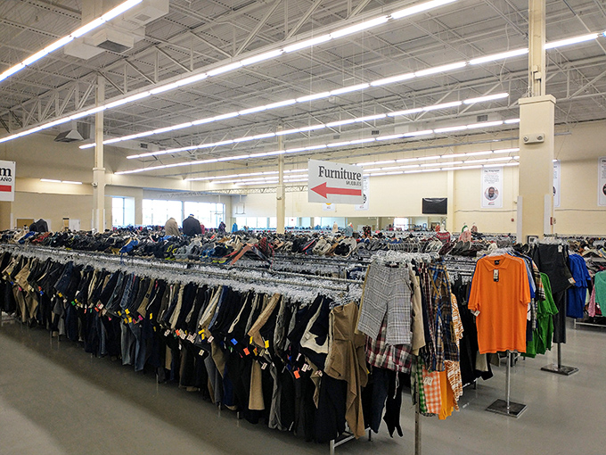 Rack after rack of possibility stretches before you like a secondhand fashion runway. That bright orange shirt is practically screaming, "Take me home and make me the star of your next barbecue!"
