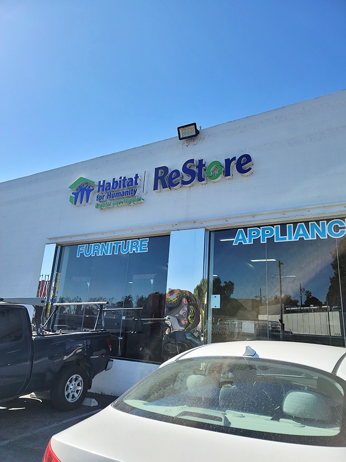 Welcome to treasure-hunting paradise! The Habitat for Humanity ReStore's bright exterior promises furniture and appliance bargains waiting inside.