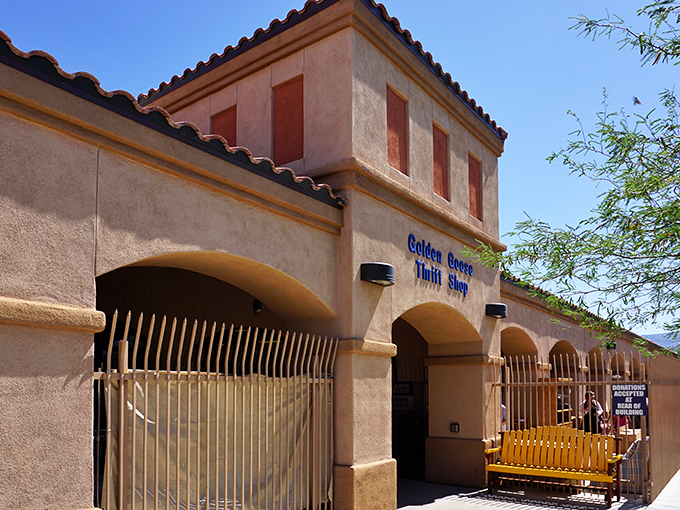 The southwestern charm of Golden Goose's exterior welcomes treasure hunters with its distinctive blue signage and arched entryways&mdash;Arizona thrifting at its finest.