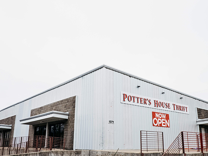 The white exterior of Potter's House Thrift stands like a bargain beacon in Springdale, promising treasures within that won't break your budget.