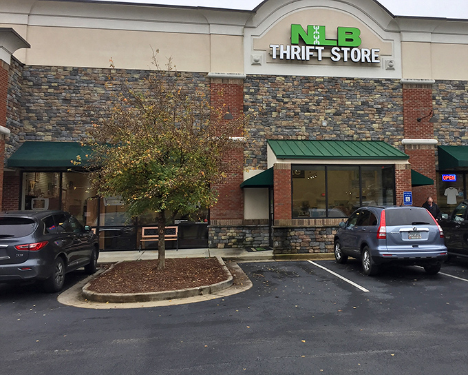 Same exterior from a different angle, where the green awnings welcome bargain seekers like a beacon of budget-friendly possibilities.