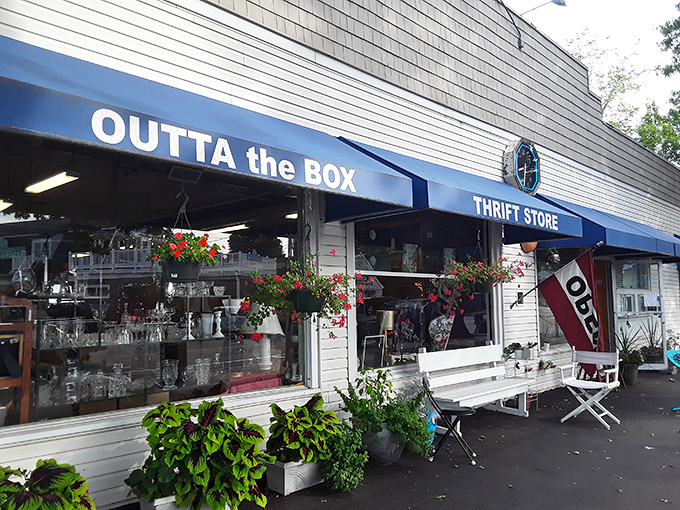 Those blue awnings beckon like a lighthouse for bargain hunters, with treasures spilling onto the sidewalk.