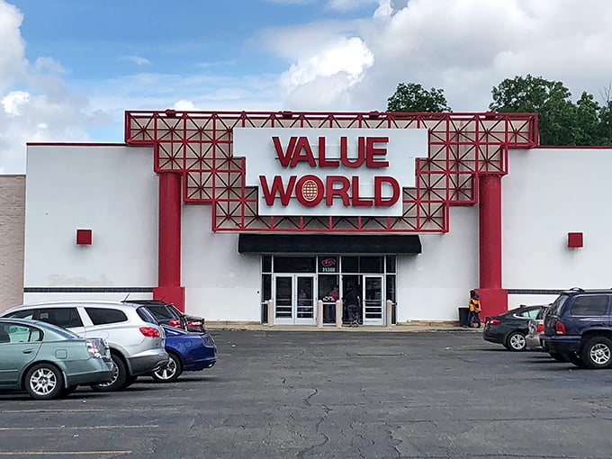 The bright red sign of Value World stands out under Michigan&rsquo;s sky, inviting shoppers to discover unbeatable bargains inside.